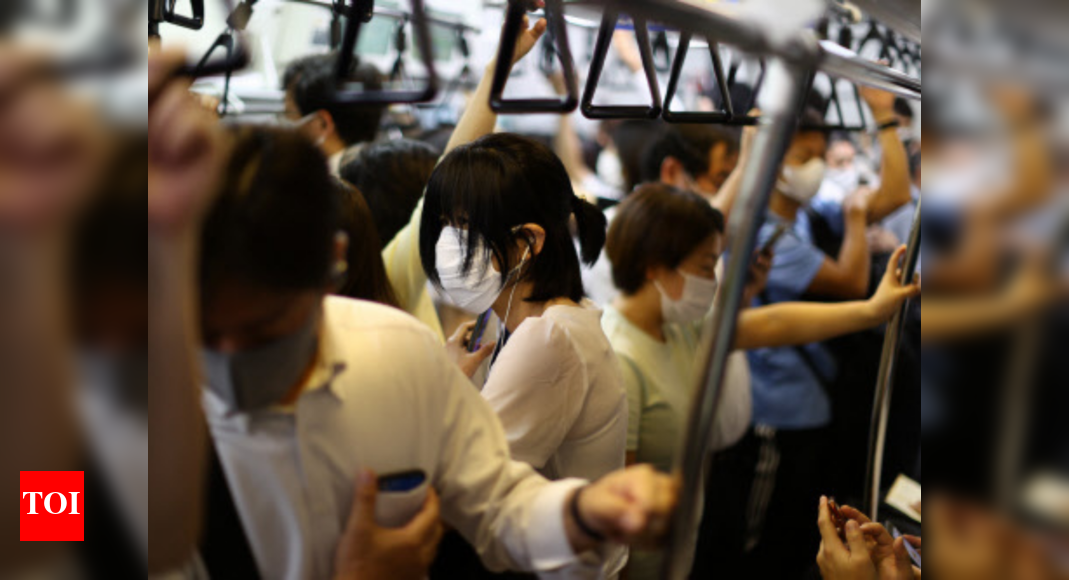 At least 10 passengers injured in stabbings on Tokyo train - Times of India