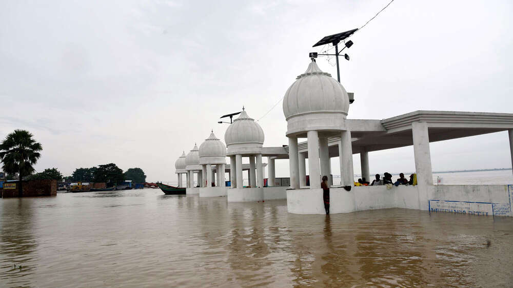 In pics: Flooded Ganga wreaks havoc, disrupts life in Bihar | The Times ...