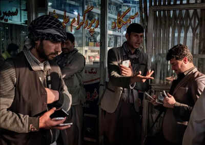 Taliban turn back Afghan govt employees returning to work - Times of India