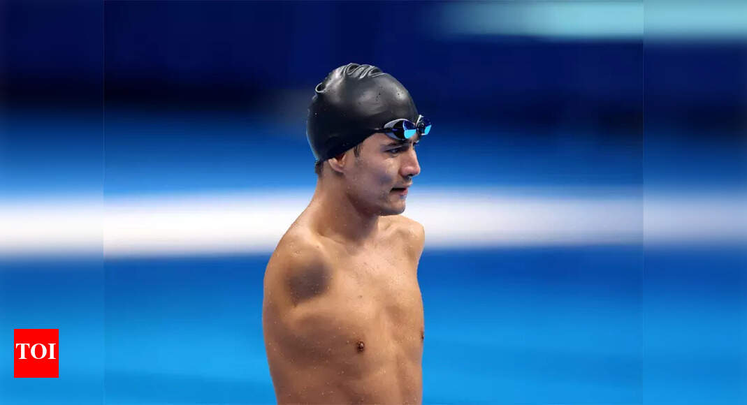 Refugee swimmer sends 'message of hope' despite missing medal | Tokyo ...