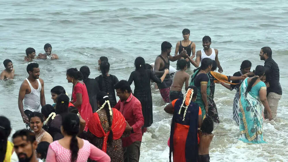 Photos: A sea of people converges at Marina beach in Chennai | The ...