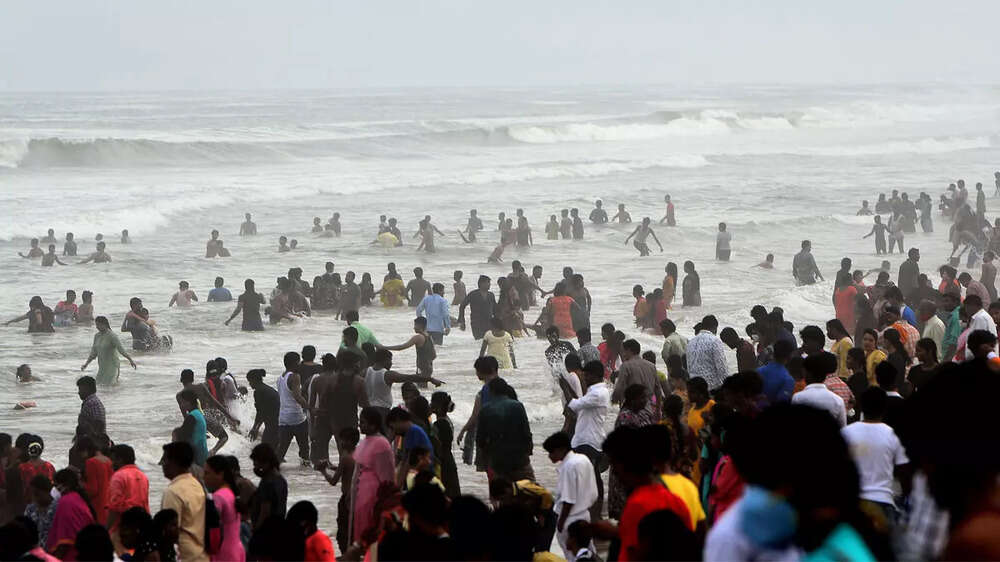 Photos: A sea of people converges at Marina beach in Chennai | The ...