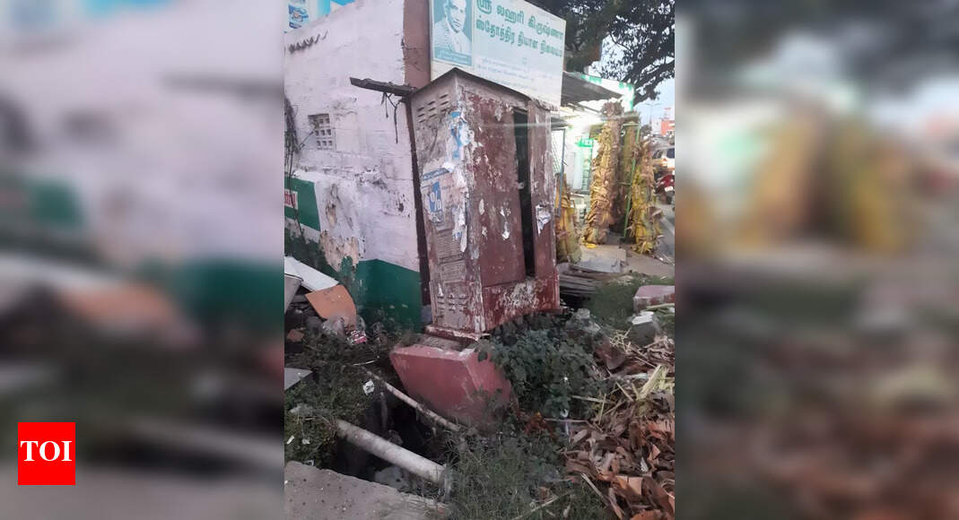 Electricity Box inside roadside Drainage - Times of India