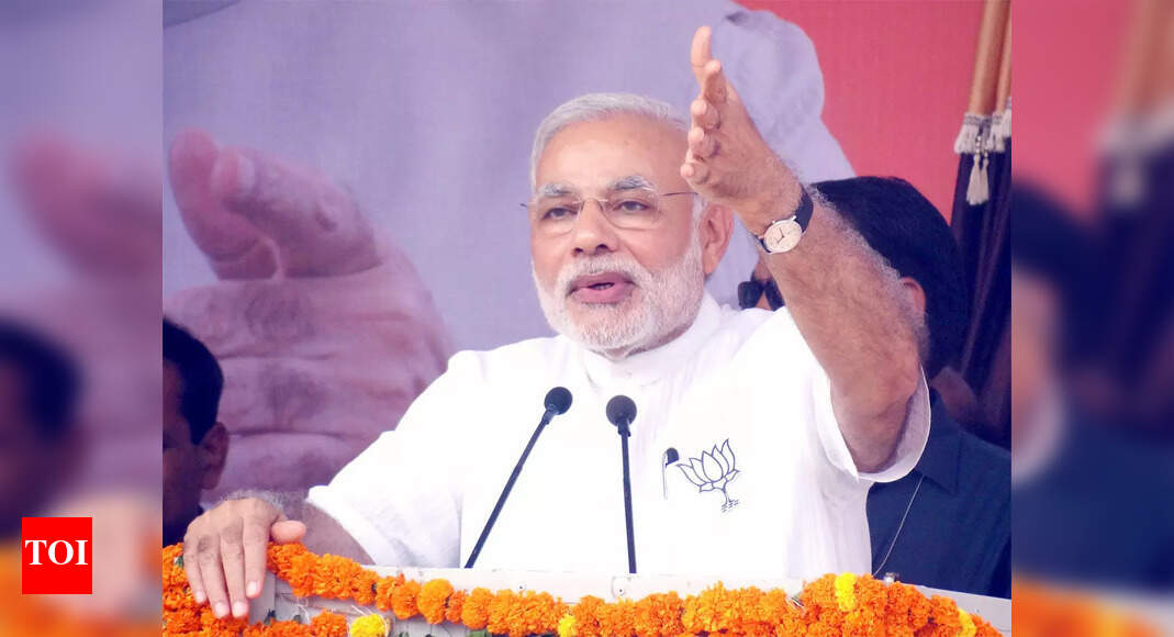 PM Modi inaugurates Sardardham Bhavan in Gujarat's Ahmedabad - Times of ...