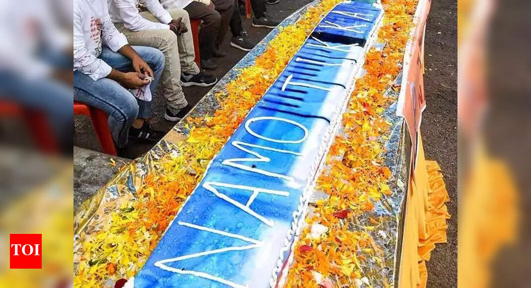 Bjp: PM Modi's birthday: BJP workers cut 71-feet-long syringe-shaped ...