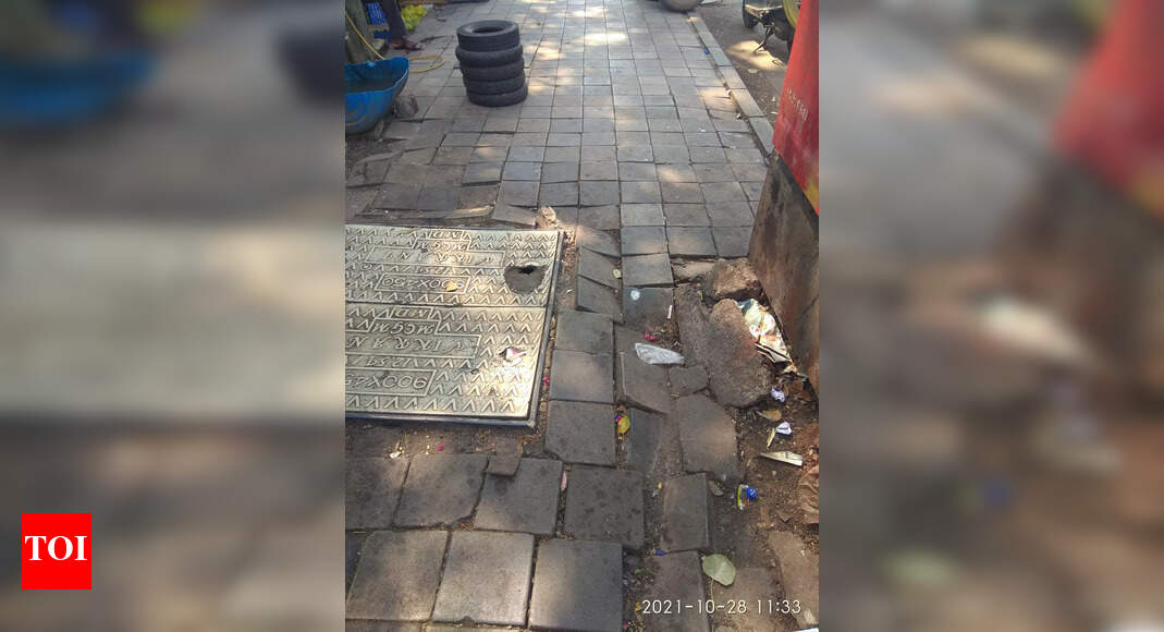 Disgraceful condition of foot path - Times of India