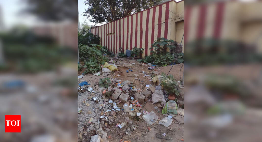 Dumping Garbage around Temple Premises - Times of India