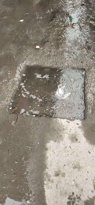 BLOCKED MANHOLE - Times of India