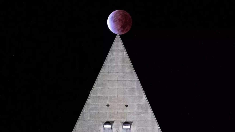 Partial lunar eclipse dubbed 'Blood Moon' dazzles night skies | The ...