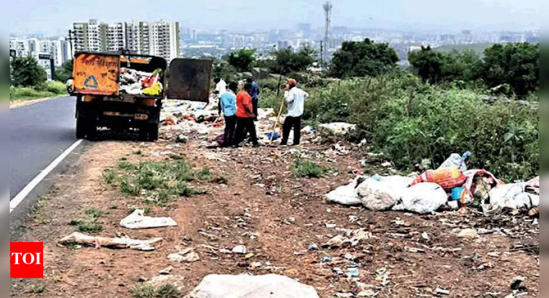 Vigil at Bopdev Ghat Road to stop open dumping | Pune News - Times of India