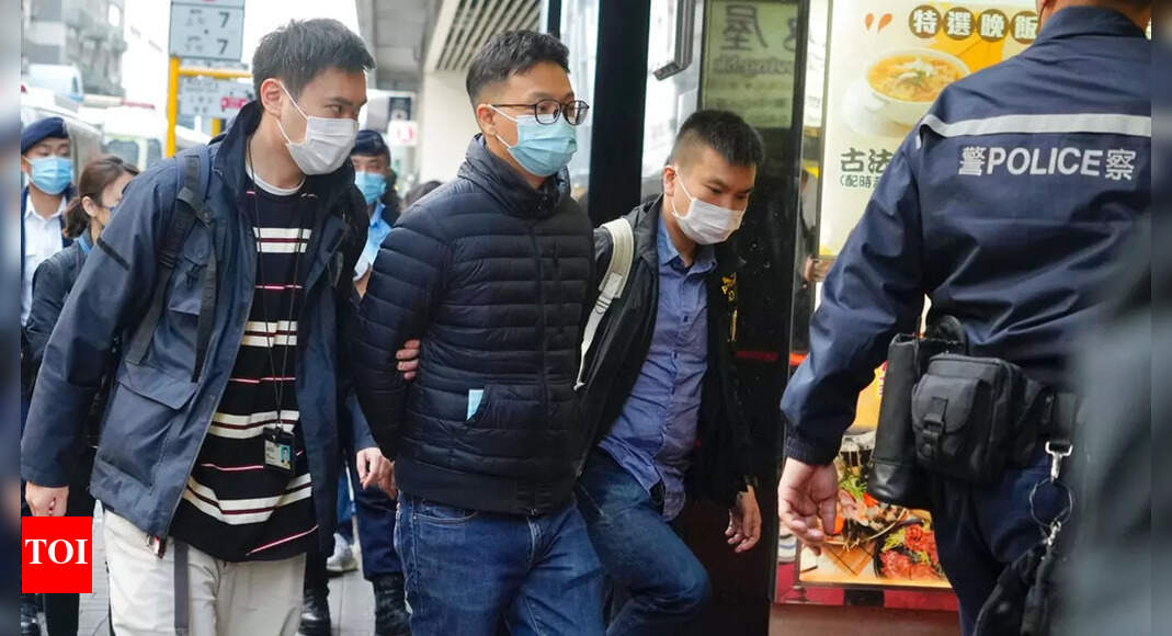 Two charged with sedition after raid on Hong Kong news outlet: Police ...