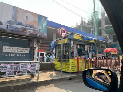 Unauthorized Stall on Footpath - Times of India
