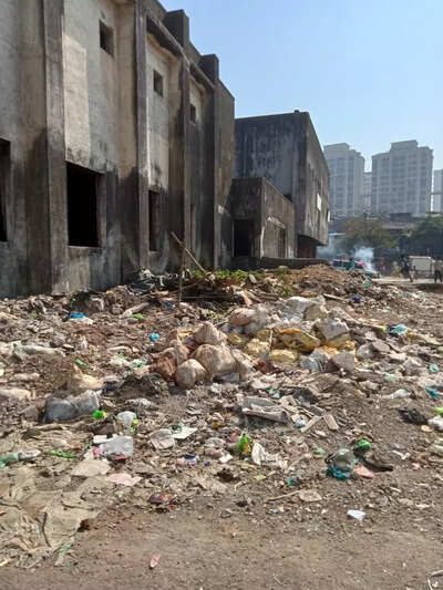 Ground is turning into a garbage spot - Times of India