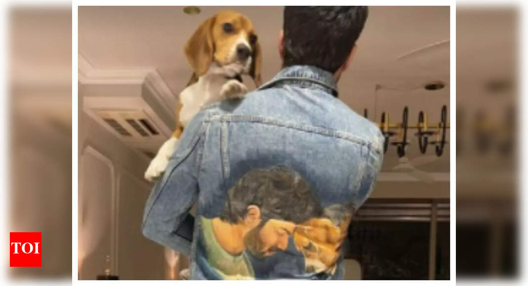 Varun Dhawan flaunts his new denim jacket with his dog Joey; See Pic ...