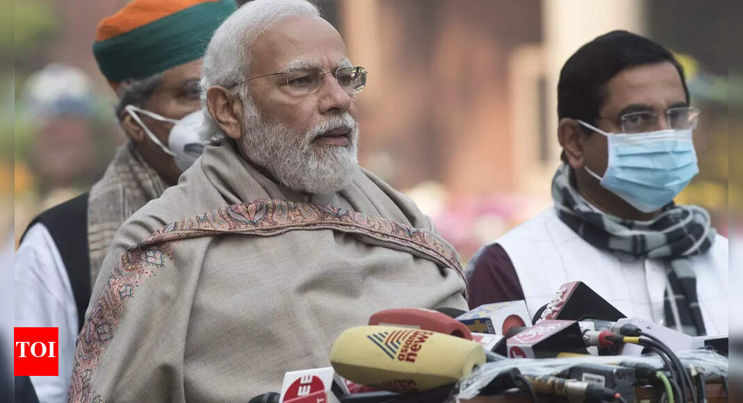 Budget: PM Modi crosses over the aisle in Parliament, bridges budget ...