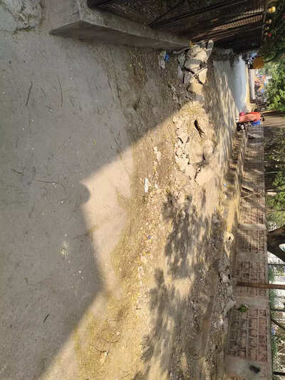 Debris on road not cleared - Times of India
