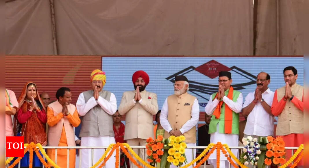 Dhami: PM Modi congratulates Dhami on taking oath as Uttarakhand CM ...