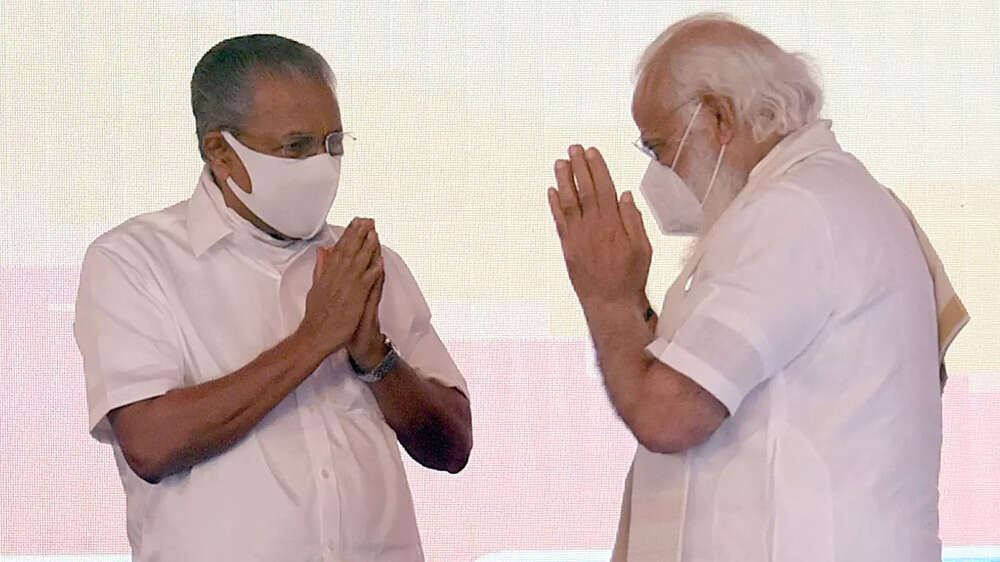 In pics: PM Modi 'charms' CM Pinarayi Vijayan | The Times of India