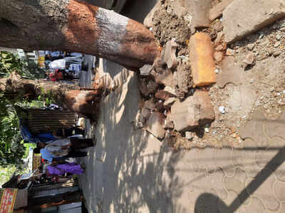 Footpath Not repaired and debris obstruction - Times of India
