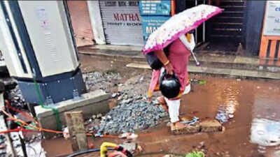Kochi: Potholes In Rain-washed Roads Turning Death Traps | Kochi News - Times of India