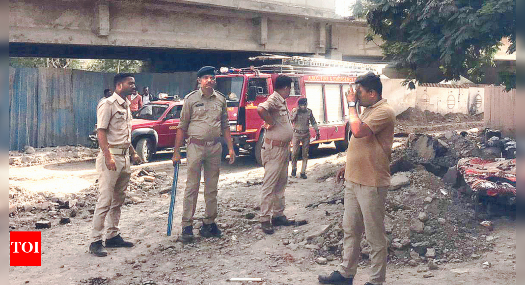 Earthmover Hits Wall, 2 Killed | Ahmedabad News - Times of India