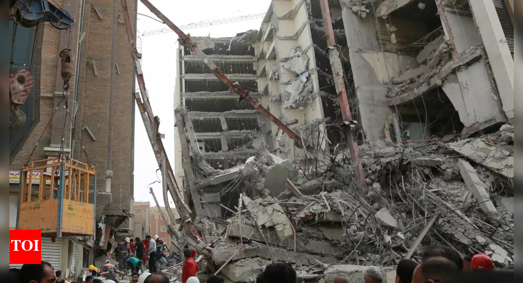 Iran: Six dead, dozens injured in Iran tower-block collapse - Times of ...
