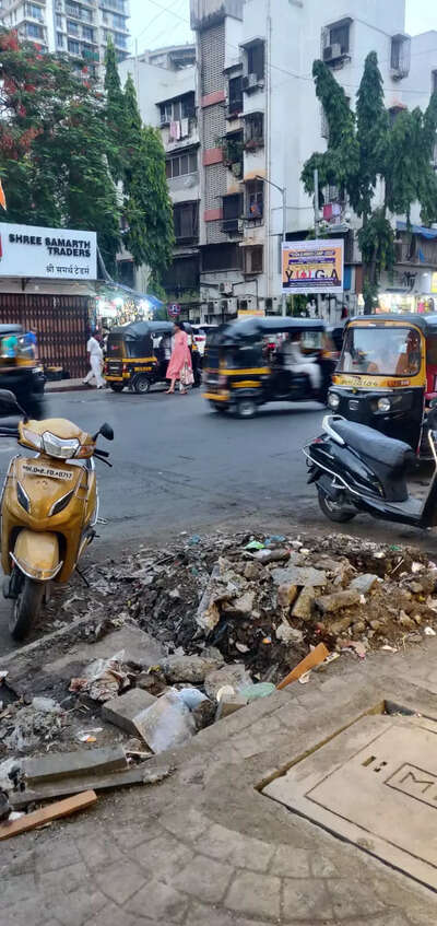 open garbage at Lokhandwala complex Andheri - Times of India