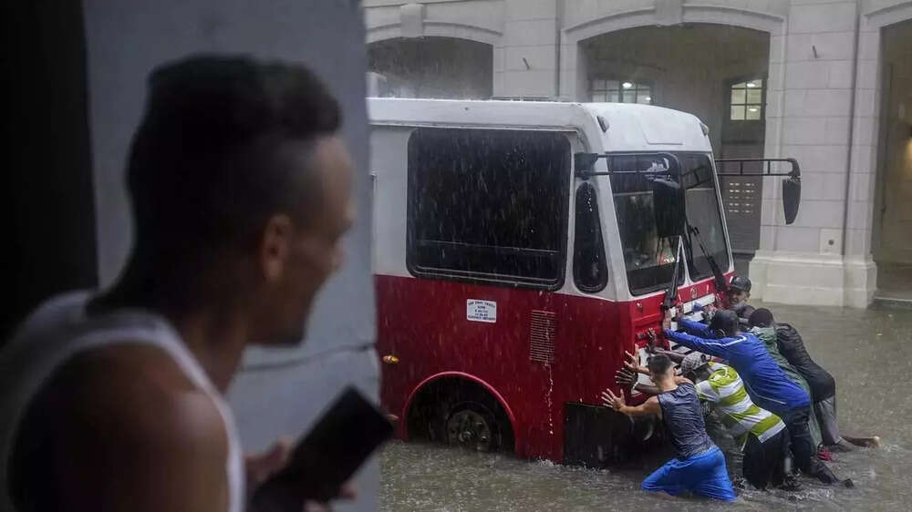 Cuba floods: Several dead as heavy rain hits island, damages dozens of ...