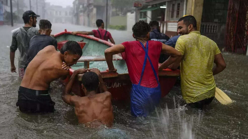 Cuba floods: Several dead as heavy rain hits island, damages dozens of ...