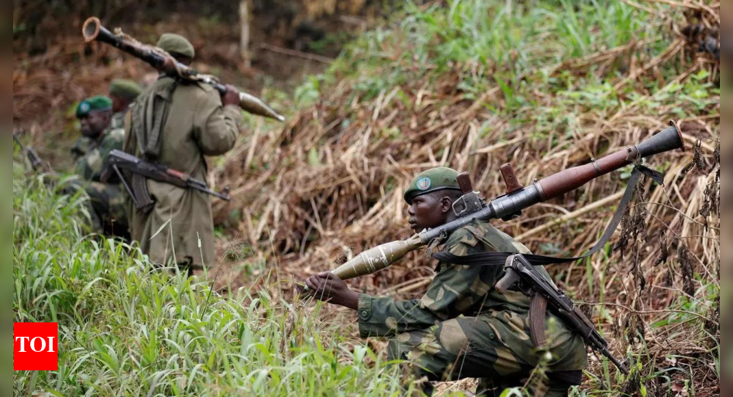 At least 20 dead in new DR Congo massacre - Times of India