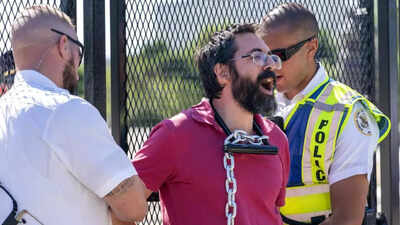 Supreme Court: Abortion rights protester locks neck to US Supreme Court ...