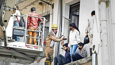 Smoke and ladders: How firemen and cops saved the day with locals ...