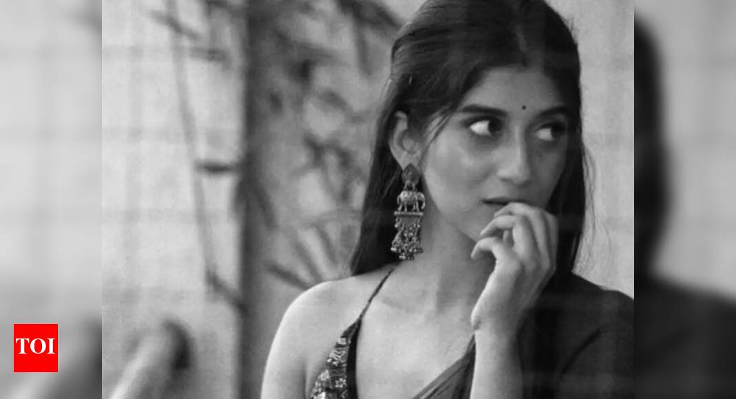 Deeksha Joshi looks elegant in a saree as she shares a black and white ...