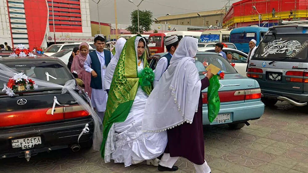 Seventy Afghan couples marry in Kabul mass wedding | The Times of India
