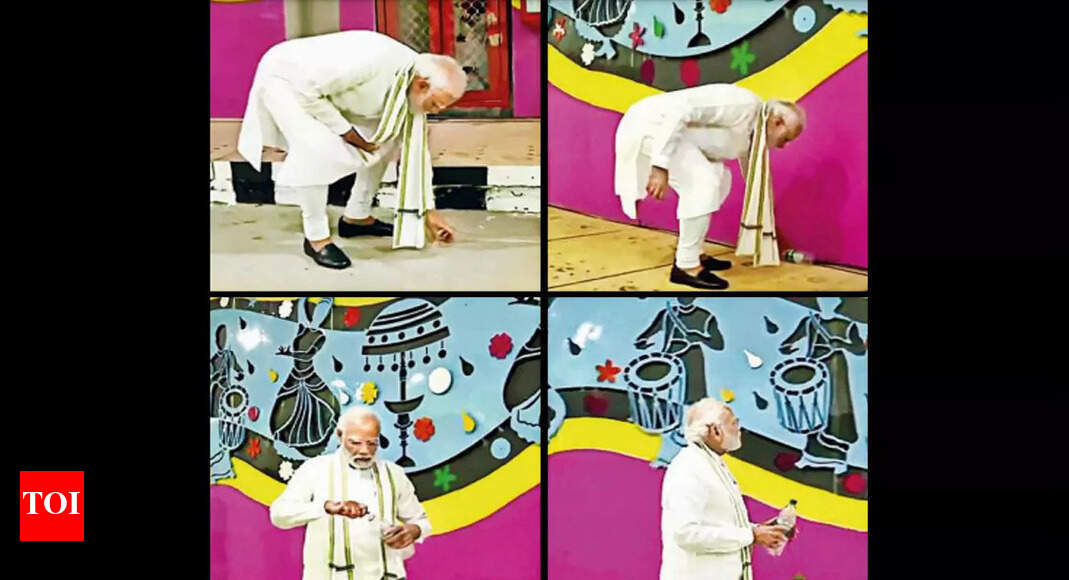 Narendra Modi: Delhi: Video showing PM Narendra Modi picking up trash ...