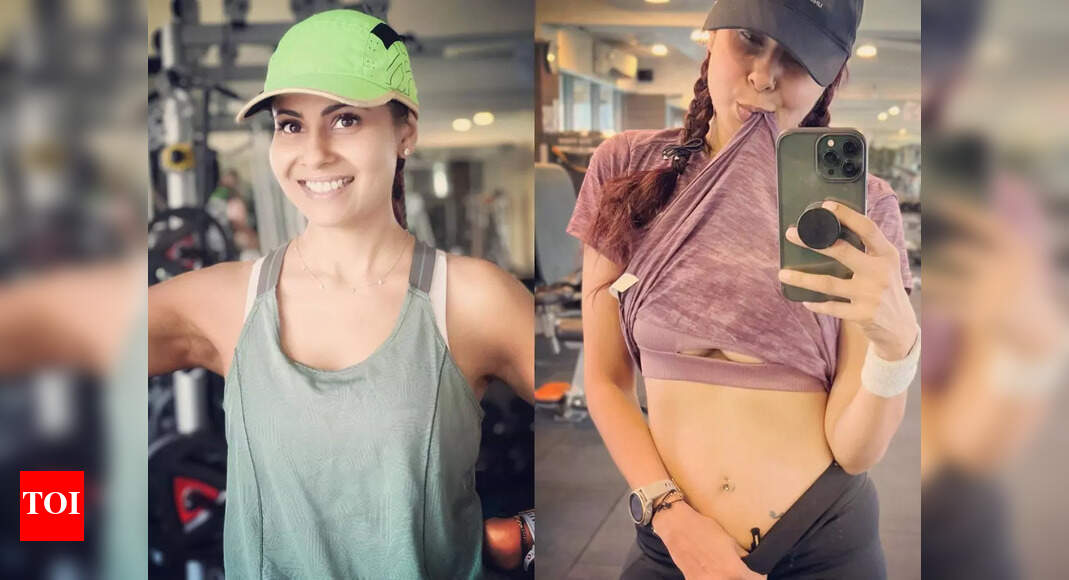 Breast cancer survivor Chhavi Mittal flaunts her toned abs after a ...