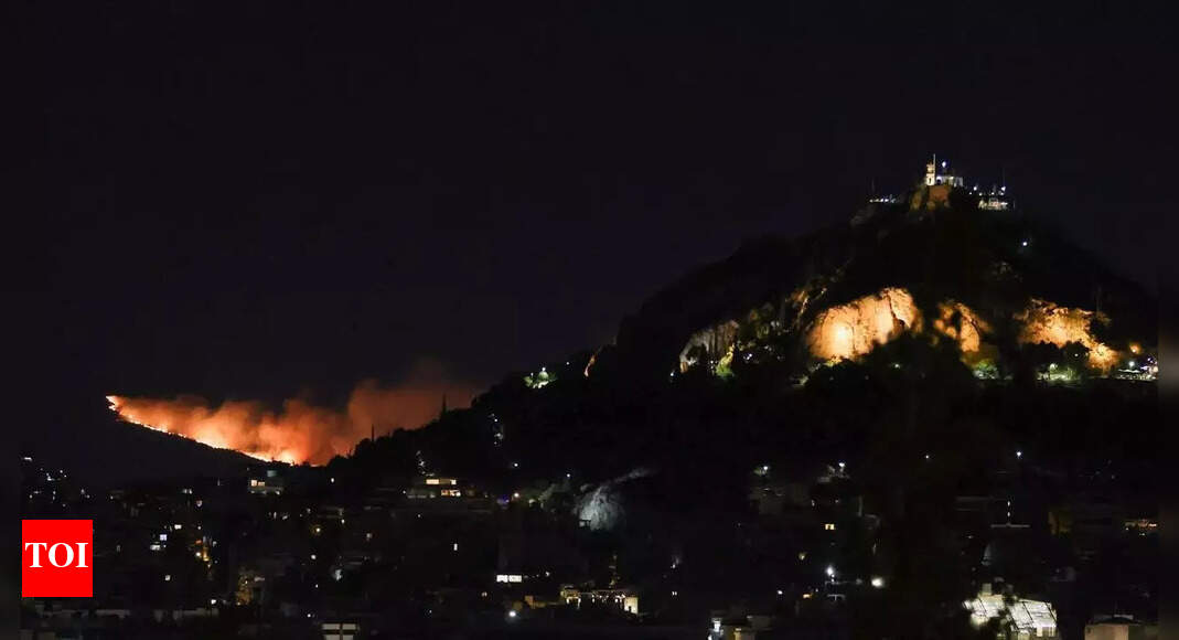 Athens: Wildfire rages near Athens; homes damaged, hospital evacuated ...
