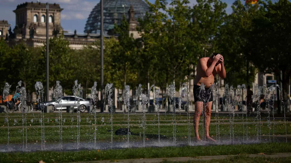 In pics: Heat wave continues in Europe, countries log record high ...