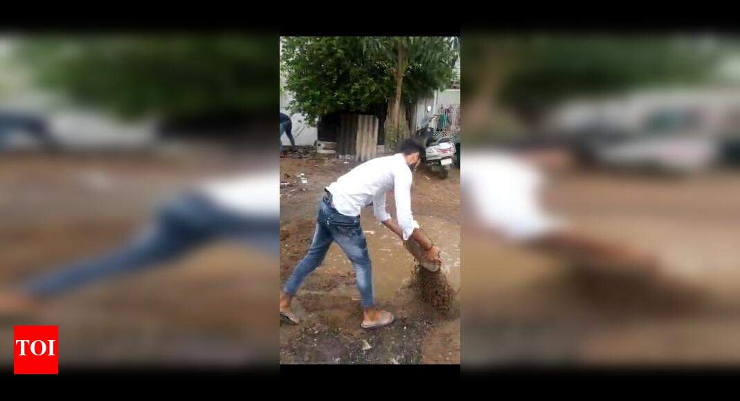 Nagpur: Irked by NMC, NIT failure to act, Deepak Nagar residents fill potholes | Nagpur News ...