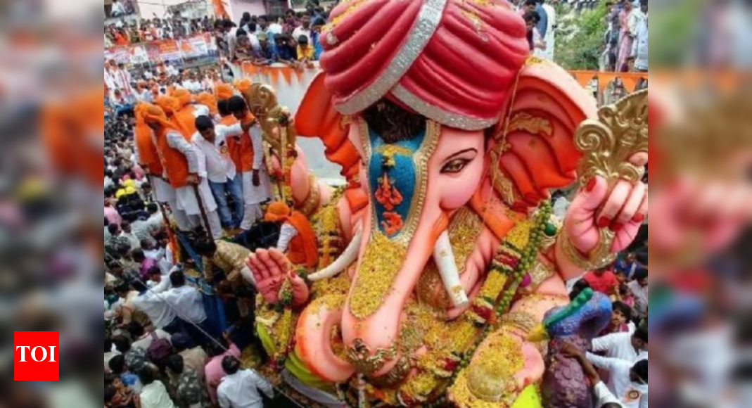Ganesh laddu Prasad auctioned for 24.60 lakh - Times of India