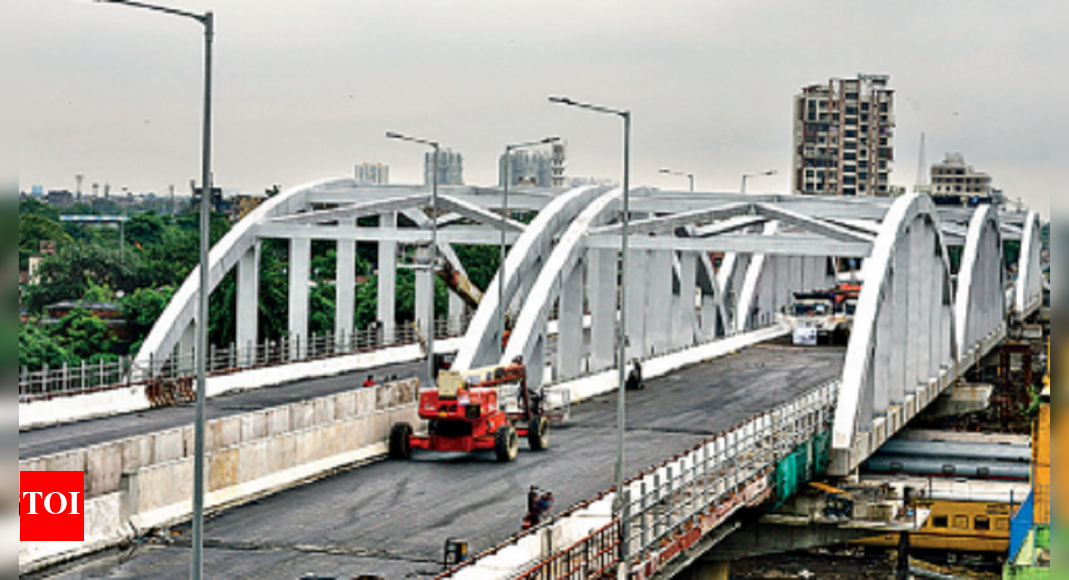 Tallah bridge reopening: Central & North Kolkata pujas hope for rise in ...