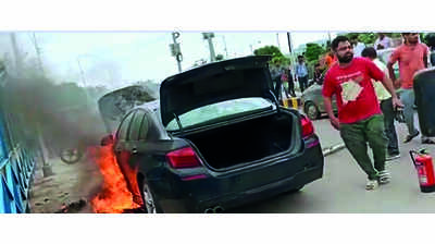 Bmw: Bmw Car Catches Fire, Driver Escapes Unhurt | Kanpur News - Times of India