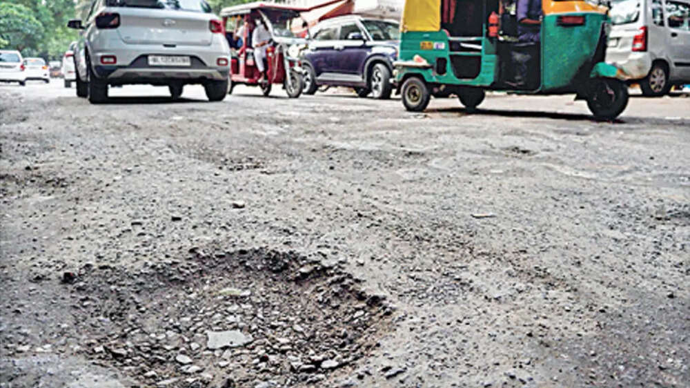In pics: Delhi pothole menace continues to distress commuters | The ...