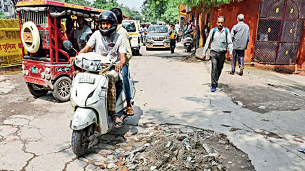 In pics: Delhi pothole menace continues to distress commuters | The ...
