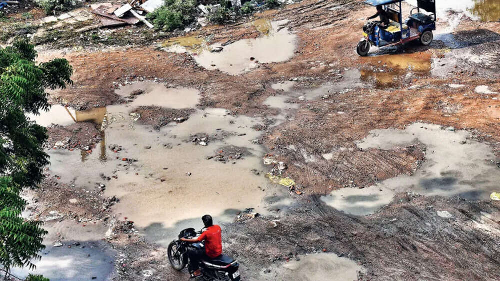 In pics: Delhi pothole menace continues to distress commuters | The ...