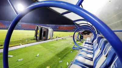 Fan loses wife, two teenage daughters in Indonesia soccer stampede ...