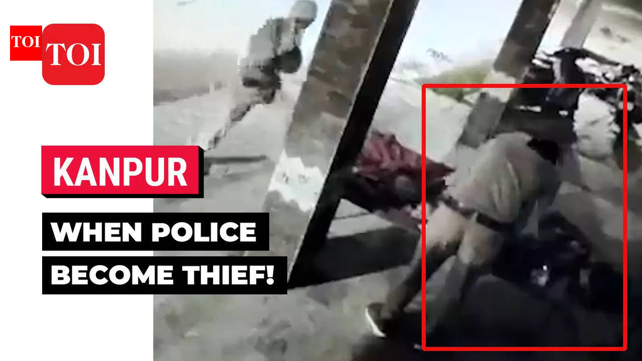 Caught on cam: Policemen steal mobile phone of a man sleeping on ...