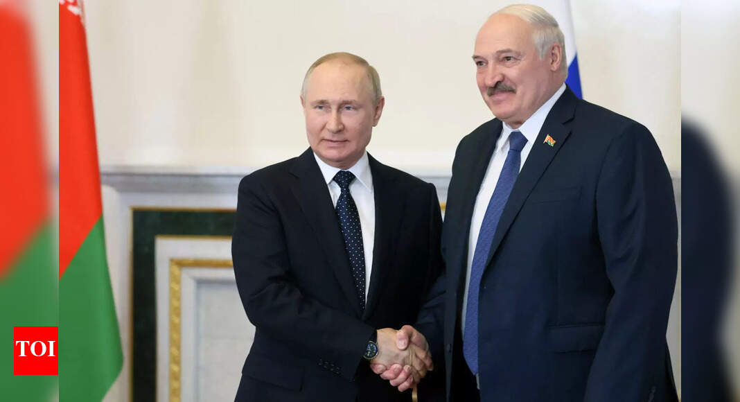 Leader of Belarus gifts Putin a tractor for 70th birthday - Times of India