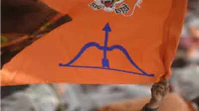 Uddhav Thackeray-led Shiv Sena faction workers carry flaming torch during visit to Bal Thackeray ...