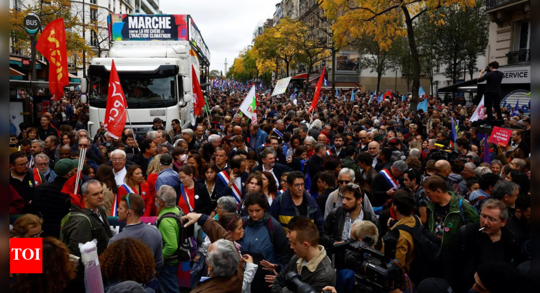Thousands take to the streets of Paris to protest soaring prices ...